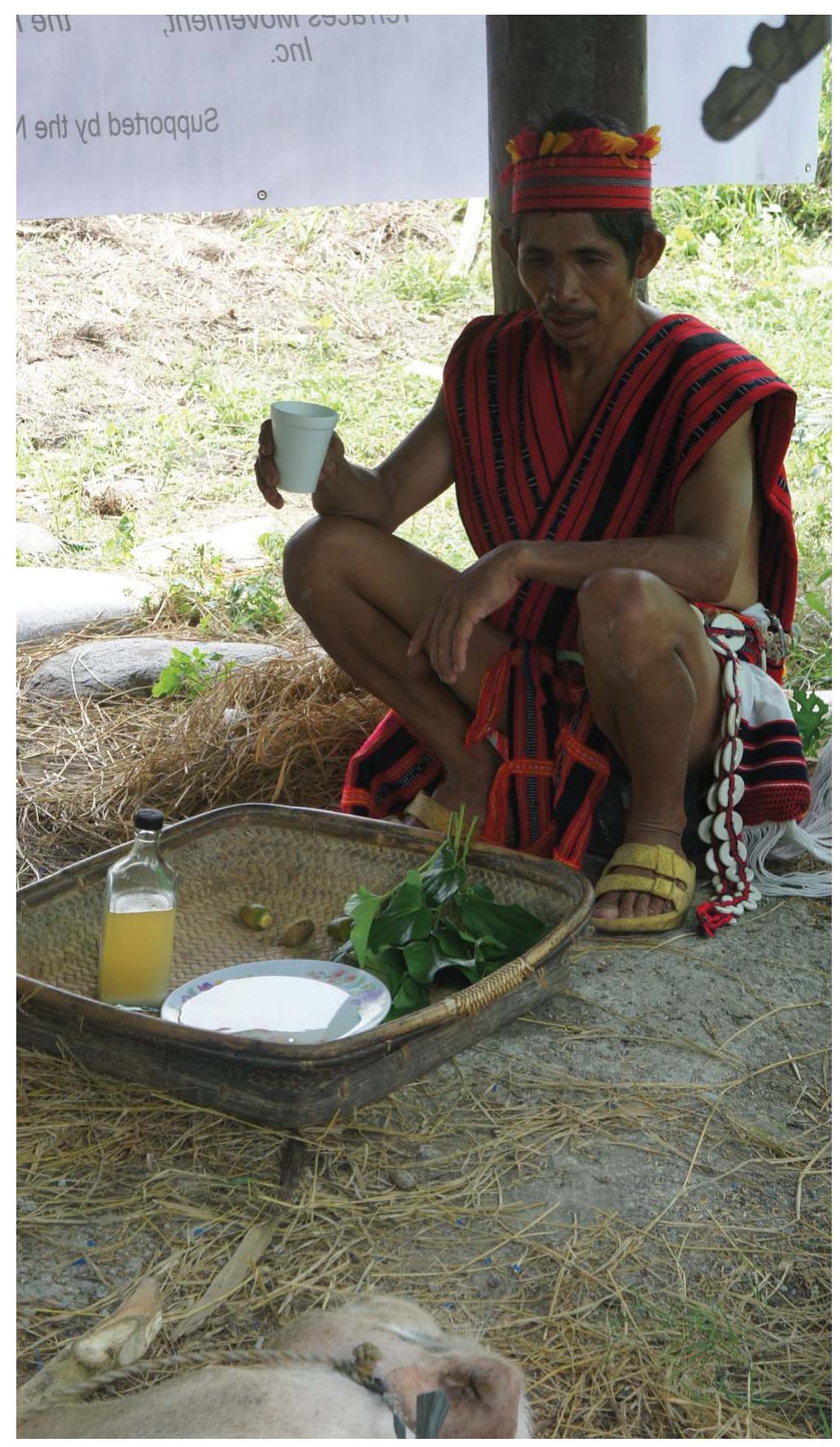 A mumbaki (ifugao religious specialist) leads the baki