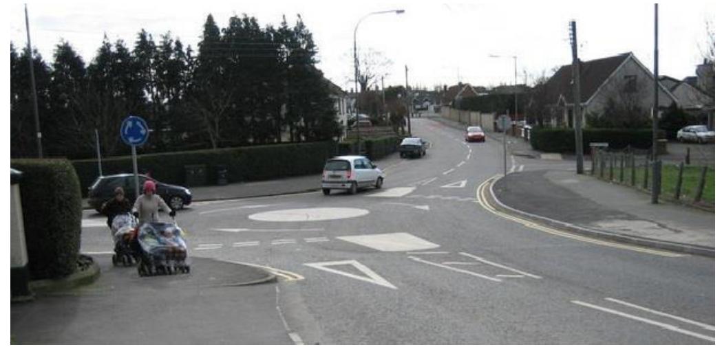 A mini-roundabout, as its name, is a smaller roundabout that