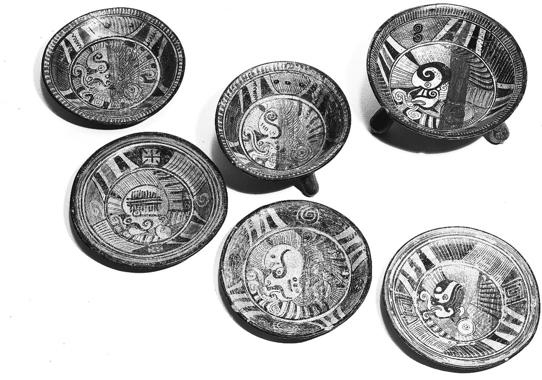 3 early cholula plates depict the maya god m, a merchant god