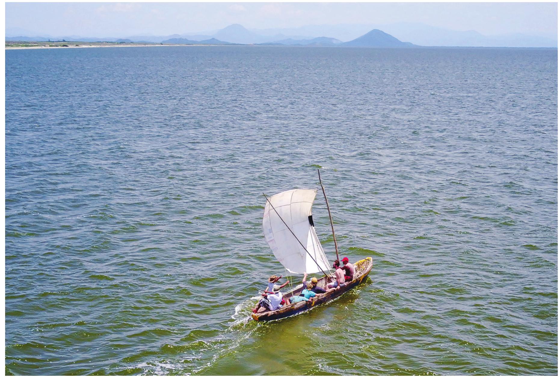 6 a huave dugout canoe outfitted with a sail. the huave