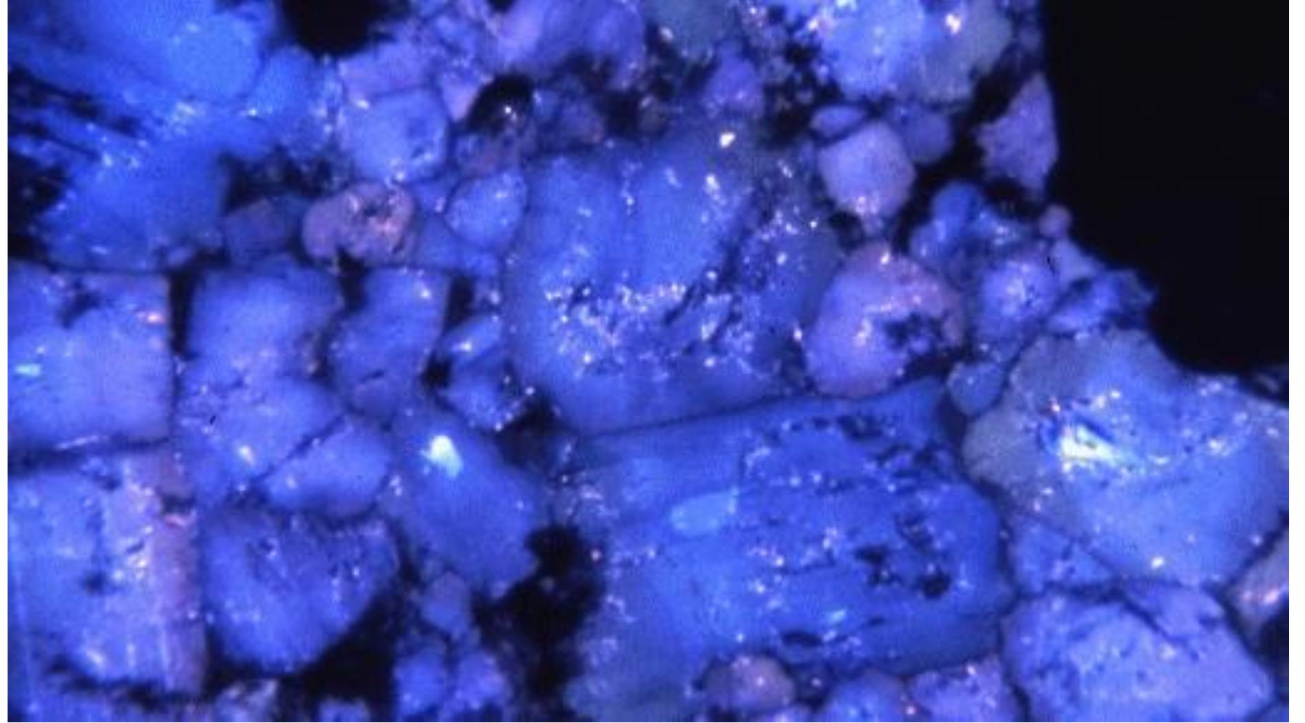 Plagioclase crystals in this cathodoluminescent image are