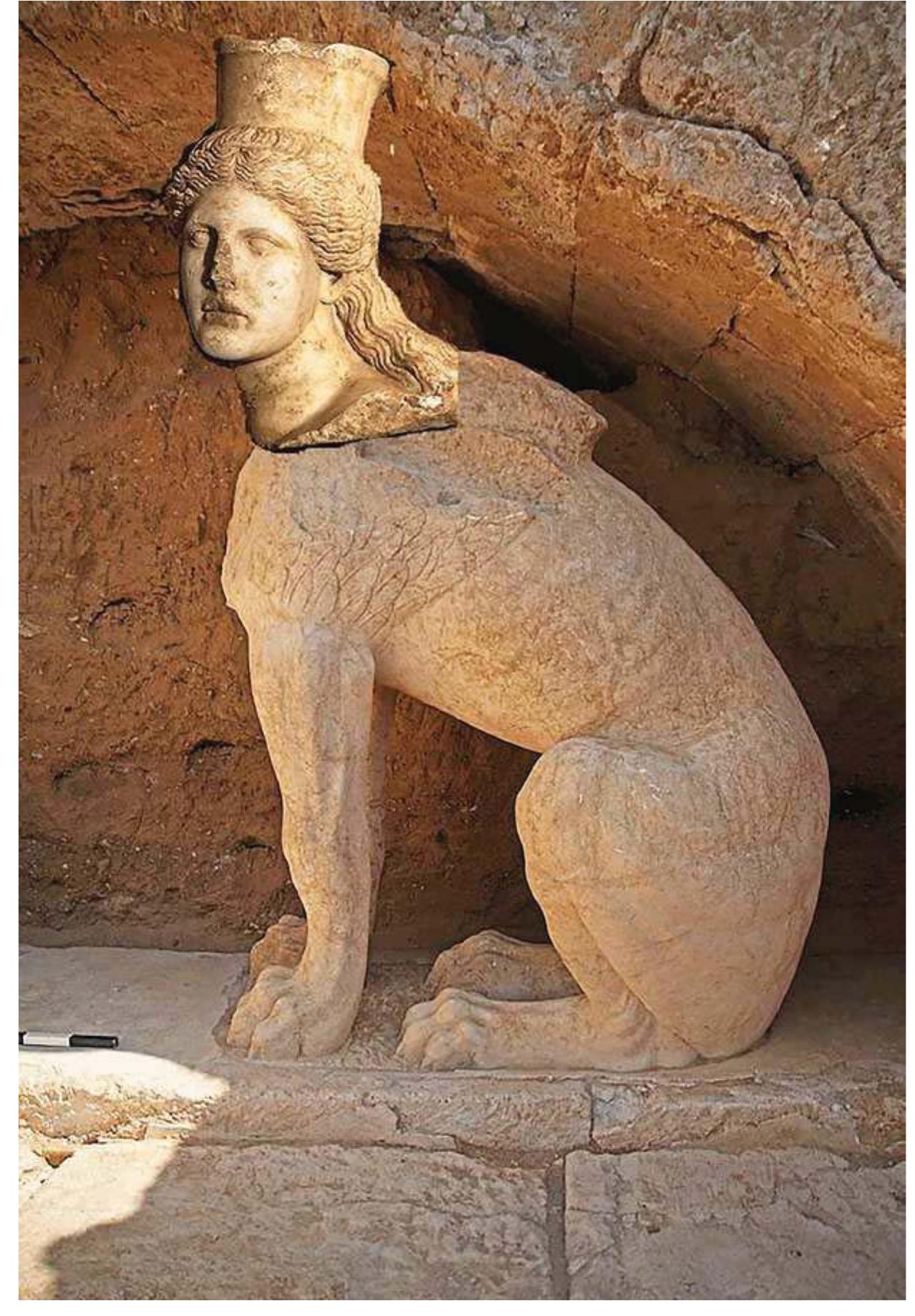 Righthand sphinx with head restored