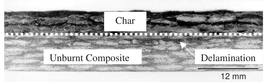 Grp composite cross-section after fire exposure showing char