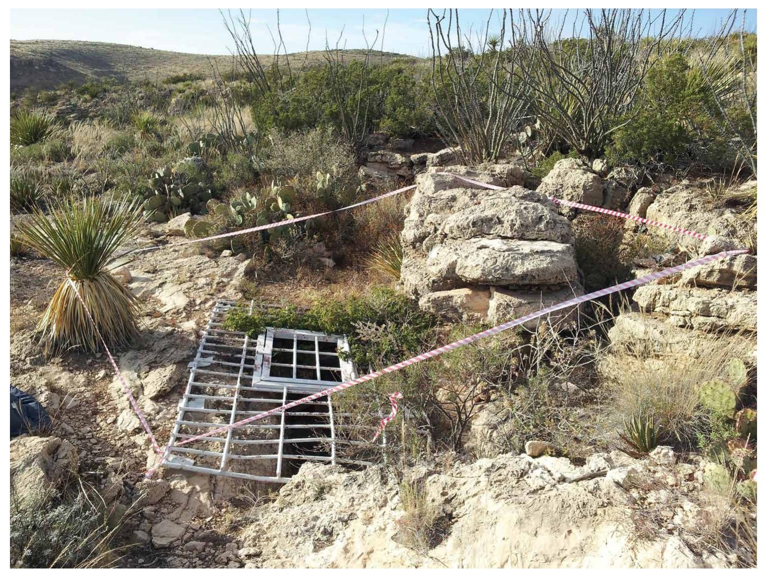 Manhole cave entrance, formed in backreef carbonates of the