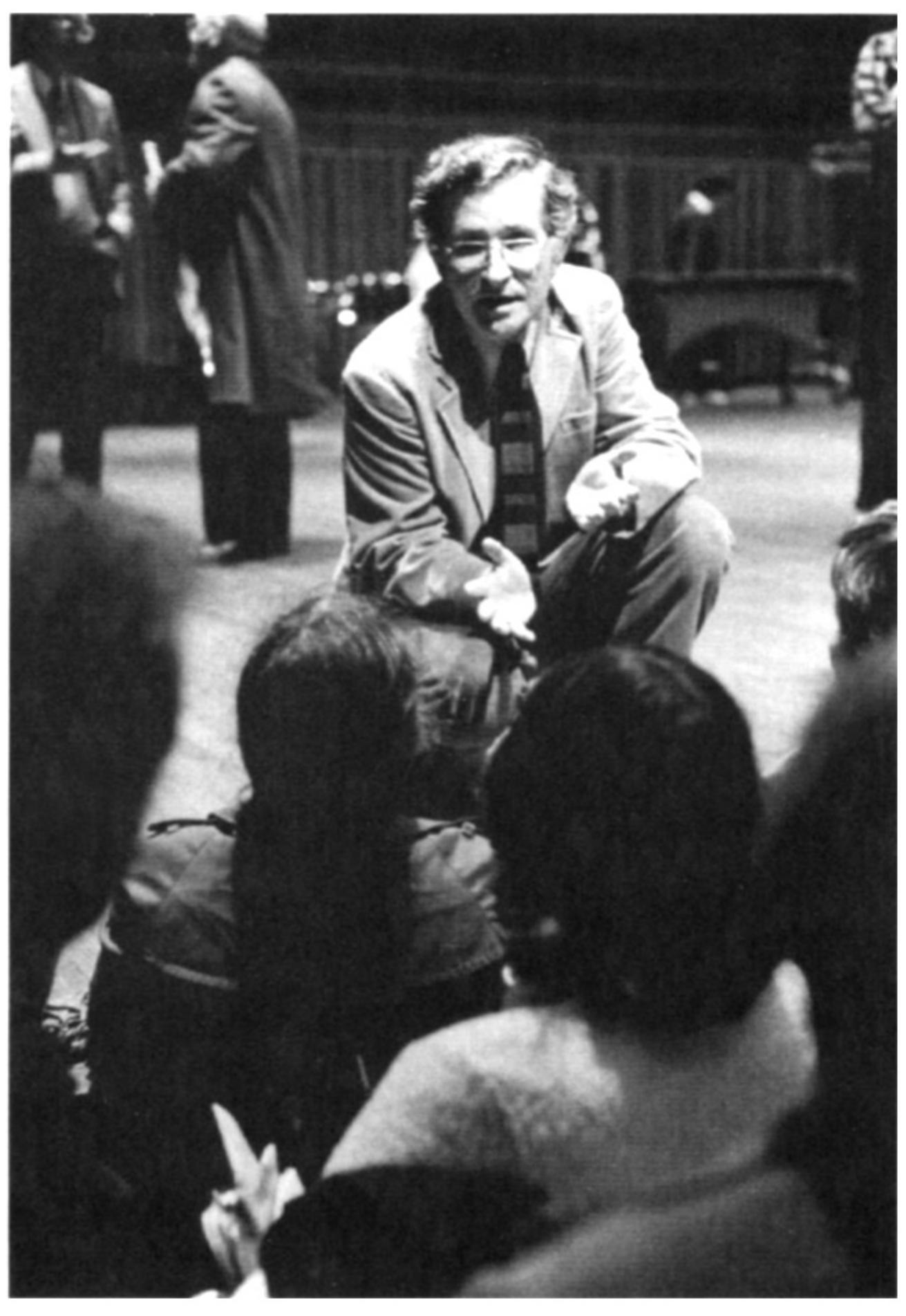 Noam chomsky addressing a crowd at the university of