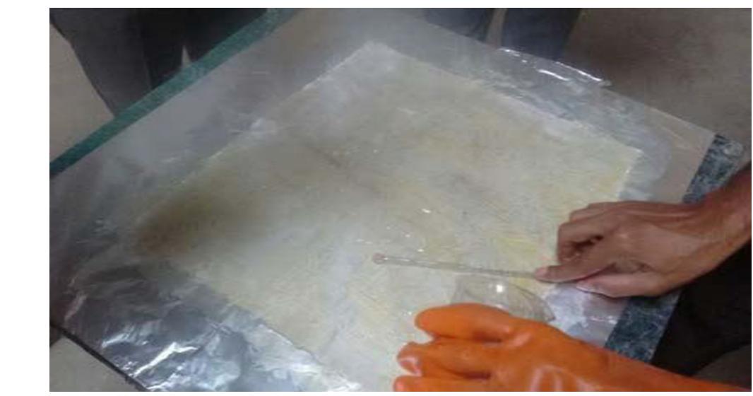 Hand lay-up process for fabricating gfrp composite