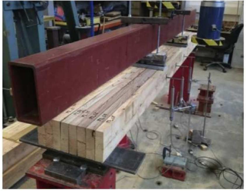 Four-point bending test setup on a dowel laminated timber