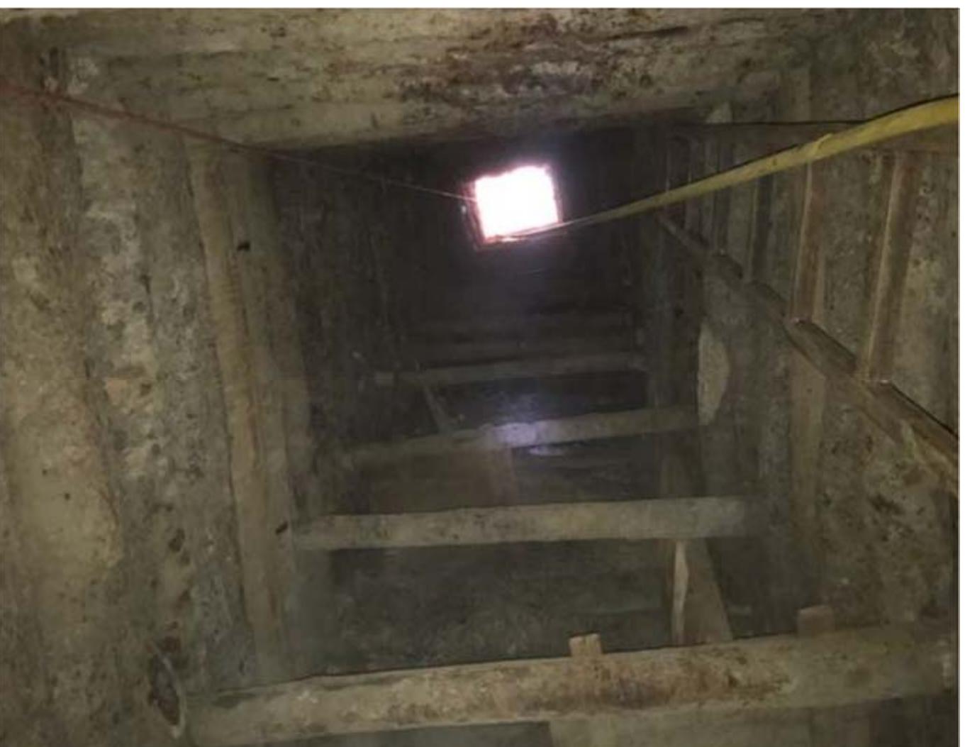 View of shaft from bottom showing cross beams for landing