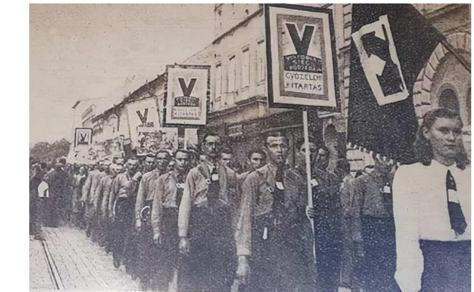 Members of the arrow cross marching through the streets of