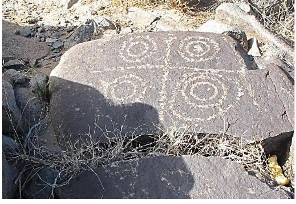 The southeast quadrant of a large circle and cross motif,