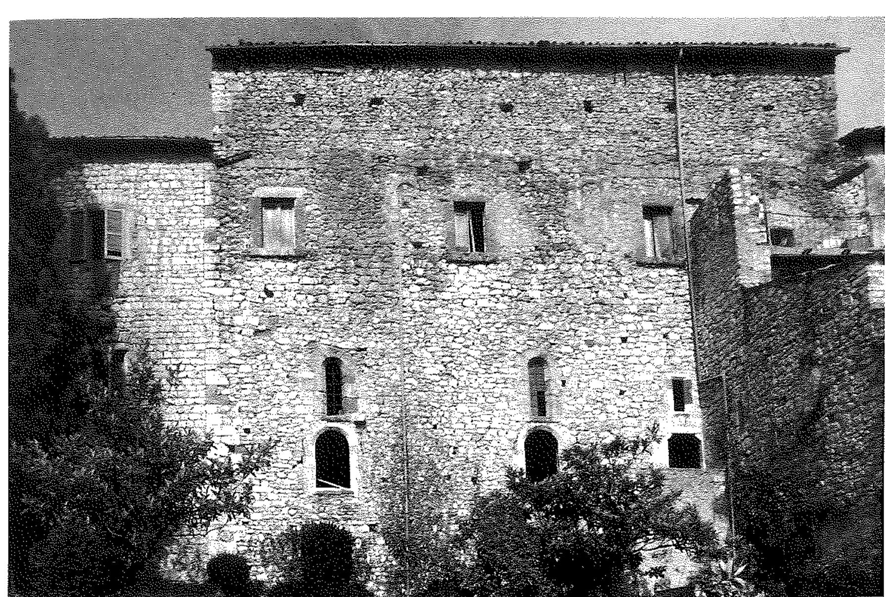 Pl. 24 — south facade of rooms j and k, showing blocked